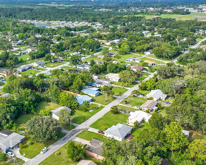 DeLand's historic district showcases classic Florida architecture where brick buildings meet towering oaks.