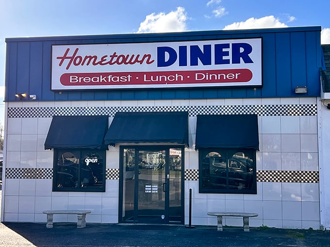 Hometown Diner's blue and white facade stands ready to welcome hungry travelers with promises of comfort food classics. 