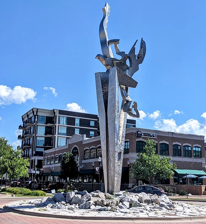 Muskegon's striking modern sculpture stands as a bold counterpoint to the city's historic buildings – art that demands attention.