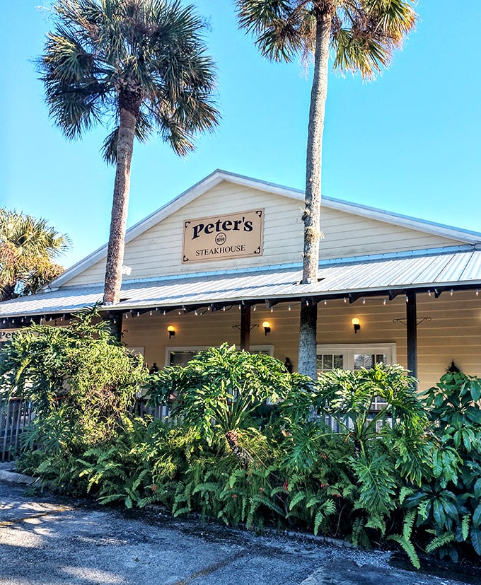 Beach house vibes meet steakhouse excellence – where flip-flops and filet mignon peacefully coexist under Jensen Beach palms.