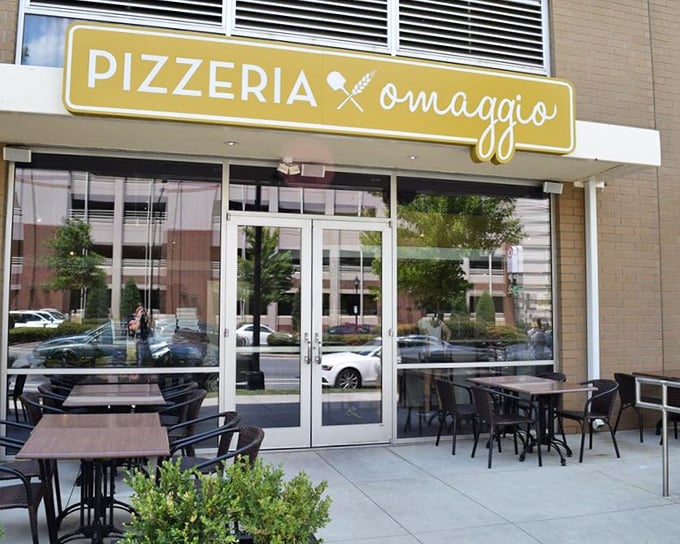 Pizzeria Omaggio's sleek daytime look is understated elegance – letting the pizza be the real showstopper.