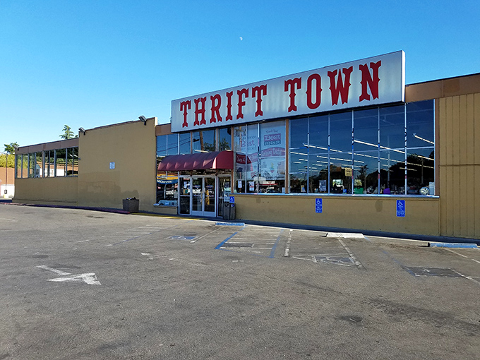"THRIFT TOWN" announces itself in can't-miss-it red letters—the Vegas of secondhand shopping without the gambling part.