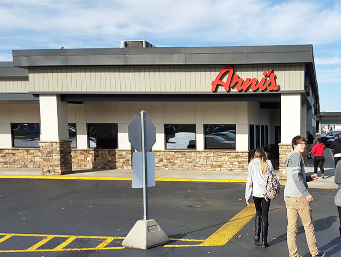 Those stone pillars aren't just holding up the building – they're supporting decades of Indiana pizza tradition.