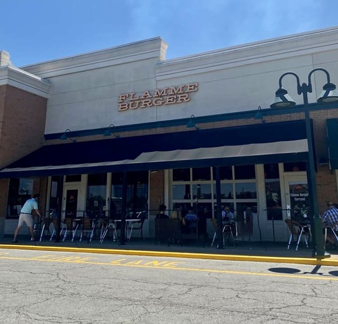 That navy awning signals a slightly upscale approach to the humble hamburger – flame-grilled perfection awaits inside.