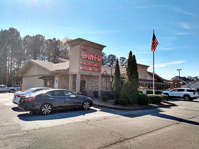 Clean lines and that bold red sign make The Diner at Sugar Hill impossible to miss—your stomach will thank you.