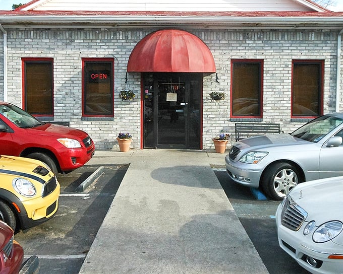 The colorful exterior of Early Bird Diner is like a rainbow that crashed into a building—in the best possible way. Charleston's most cheerful restaurant beckons hungry visitors.