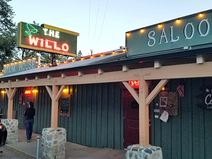 That neon glow isn't just a sign—it's a beacon of hope for hungry travelers seeking carnivorous salvation in the Sierra foothills.