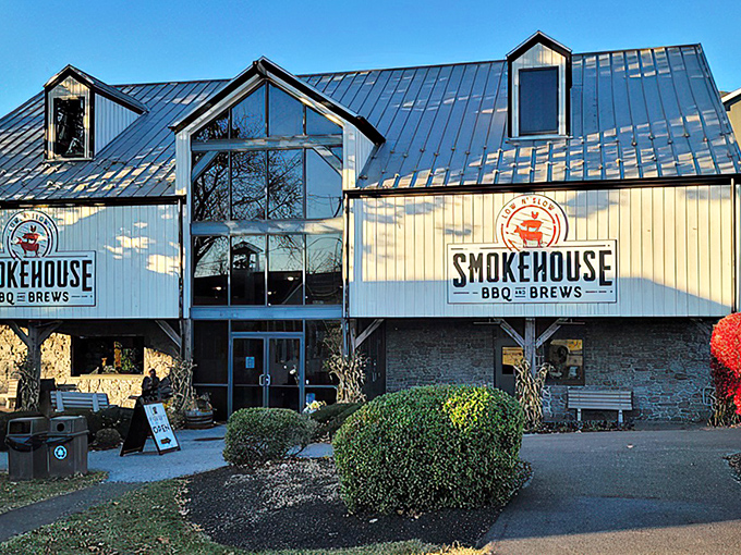 The gleaming metal roof and rustic-modern exterior of Smokehouse BBQ & Brews stands as a beacon of hope for hungry travelers in Amish Country.