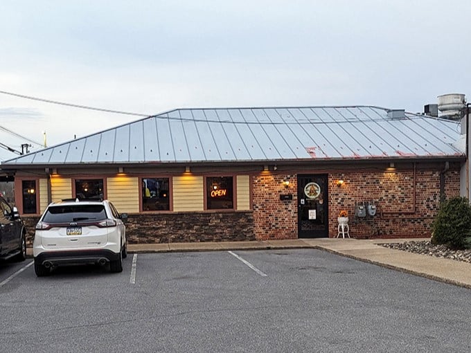 The unassuming brick exterior of Bonfire Old Fashioned BBQ hides a smoky paradise within. Like finding treasure in your own backyard.