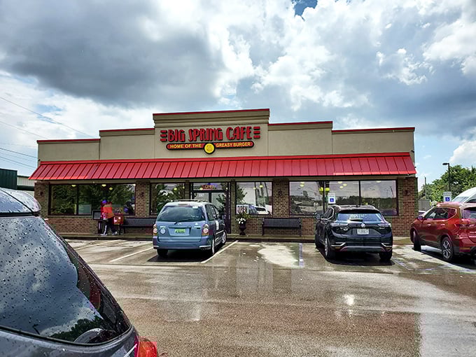The bright red awning of Big Spring Cafe beckons like a beacon for burger lovers. Huntsville's oldest restaurant doesn't need fancy architecture to draw crowds.