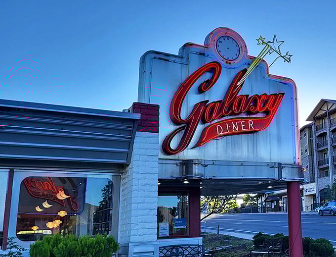 The neon glow of Galaxy Diner's sign against the Flagstaff sky isn't just illumination—it's a beacon calling hungry travelers home to Route 66 nostalgia.