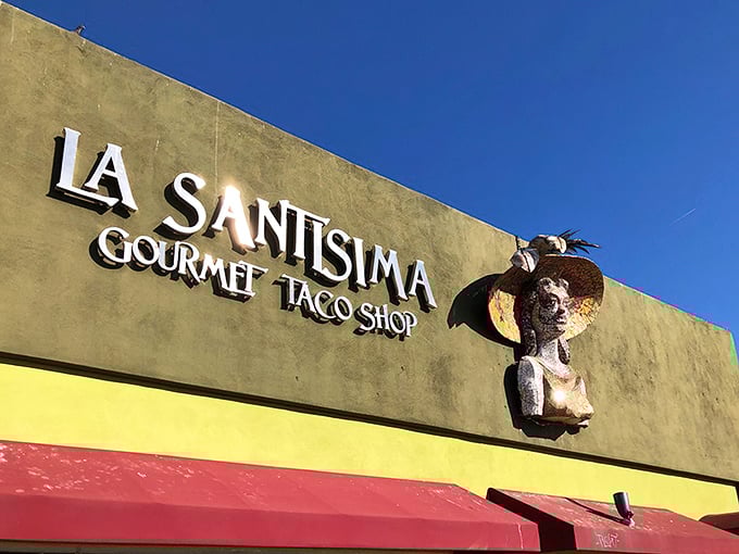 La Santisima's exterior welcomes hungry visitors with its distinctive colors and artistic flair—a preview of the flavor fiesta waiting inside.
