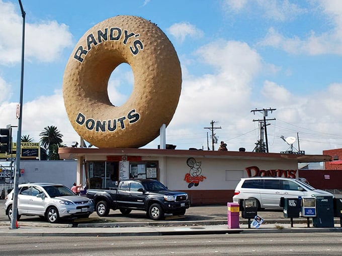America’s most iconic donut rises above Inglewood, guiding sweet-toothed pilgrims from afar like a frosted beacon of indulgence.