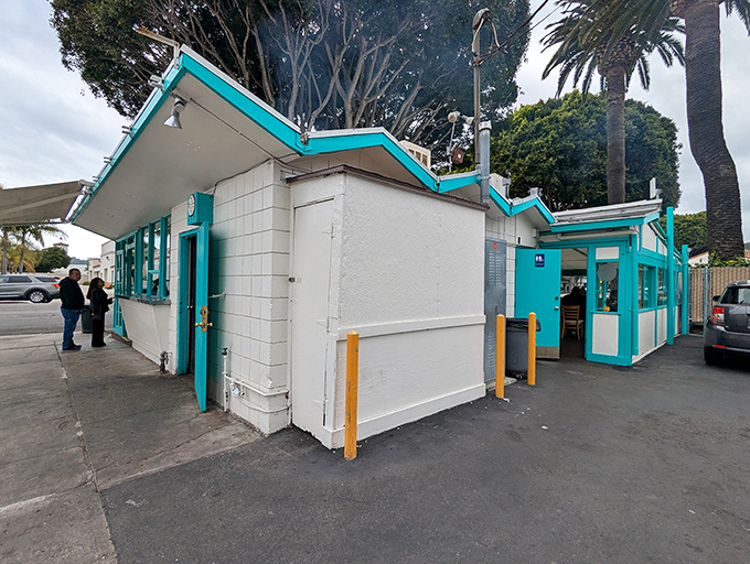 The unassuming turquoise facade of La Super-Rica Taqueria stands like a beacon of culinary promise under Santa Barbara's swaying palms.