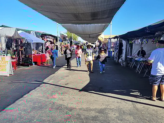 Vibrant religious icons and colorful trinkets line the walkway, where every stall feels like opening a treasure chest of cultural artifacts.