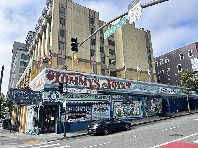 Tommy's Joynt stands out on Van Ness Avenue like a carnival barker in a library—loud, proud, and impossible to ignore with its vibrant hand-painted exterior.