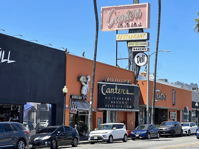 Canter's Deli's iconic orange facade rises like a beacon on Fairfax Avenue, offering round-the-clock comfort and classic eats to hungry Angelenos.