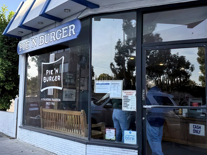 The iconic blue-trimmed storefront of Pie 'n Burger stands as a beacon of culinary constancy in Pasadena's ever-changing landscape.