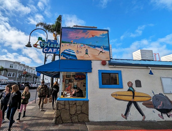 The iconic blue and white exterior of Splash Café stands like a beacon of hope for hungry beach-goers. That line? Worth every minute.