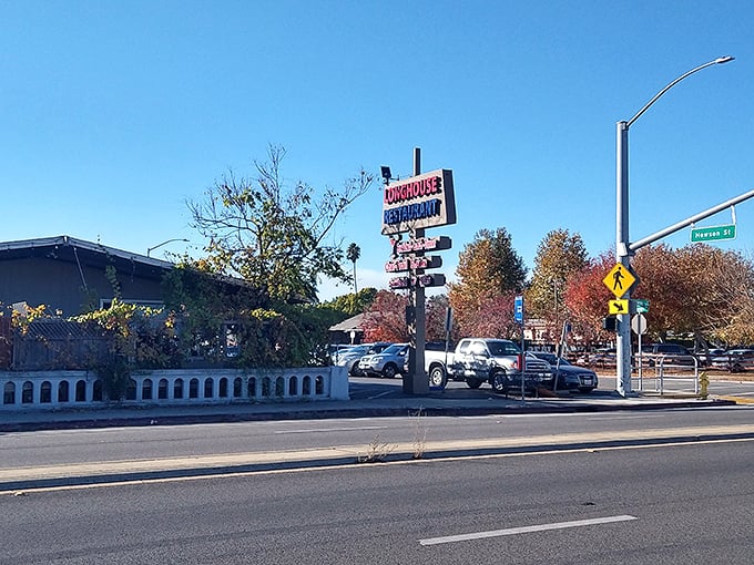 The unassuming exterior of Longhouse Restaurant in Gilroy hides culinary treasures within. String lights add a welcoming touch to this local gem.