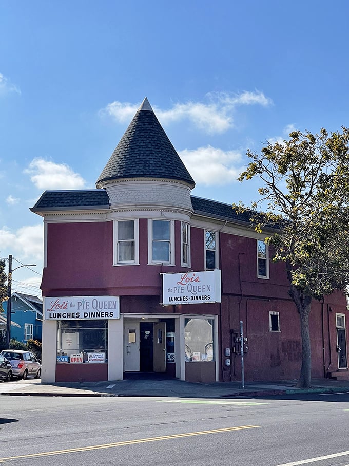 The pink corner building that houses Lois the Pie Queen stands like a beacon of comfort food in Oakland, promising Southern delights within its unassuming walls.