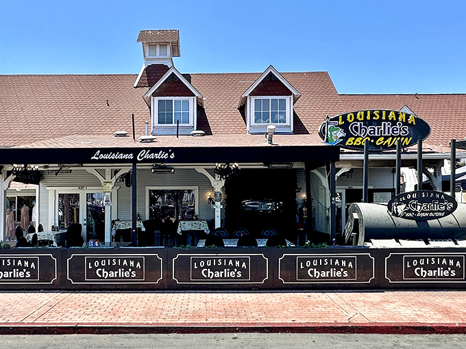 Louisiana Charlie's charming cottage-style exterior beckons hungry travelers with its peaked roof and welcoming porch—a little slice of New Orleans in sunny Long Beach.