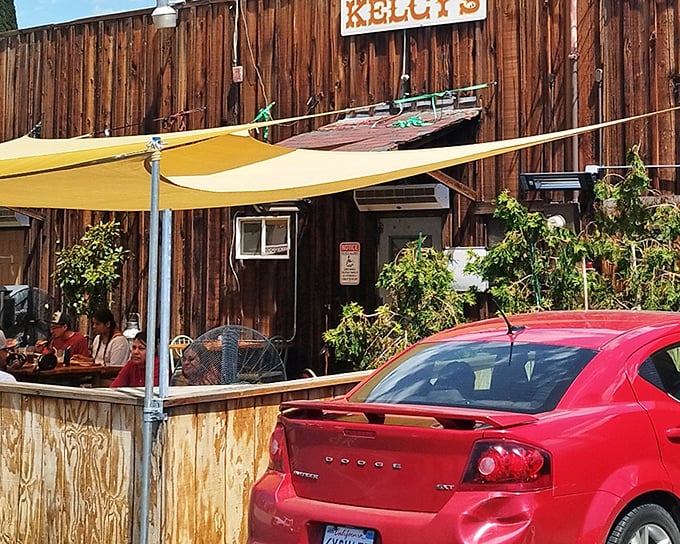 The iconic yellow "CAFE" sign above Kelcy's wooden facade isn't just advertising – it's a beacon of hope for hungry travelers and locals alike.