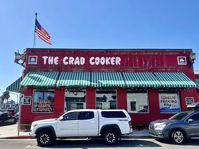 That fire-engine red exterior isn't subtle, but neither is your hunger when you spot The Crab Cooker's iconic façade on Newport's peninsula.