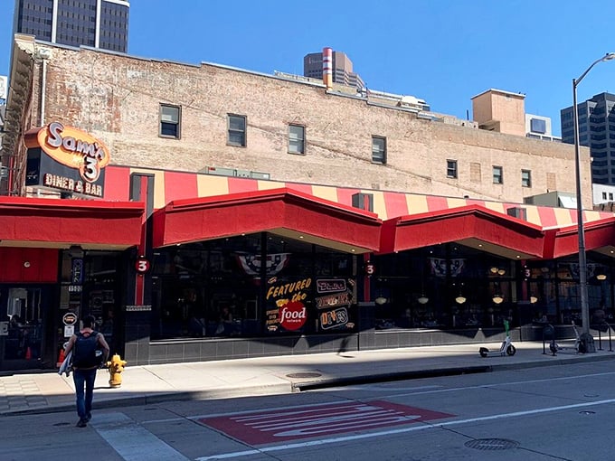 By day, Sam's No. 3 stands proud on the Denver streetscape, its classic diner profile and striped awning a refreshing throwback in a sea of modern architecture.