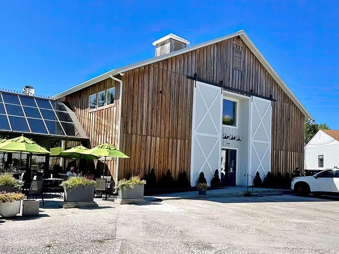 The barn-like exterior of The Station on Kings isn't just rustic chic—it's a culinary fortress guarding some of Delaware's most coveted cinnamon rolls.