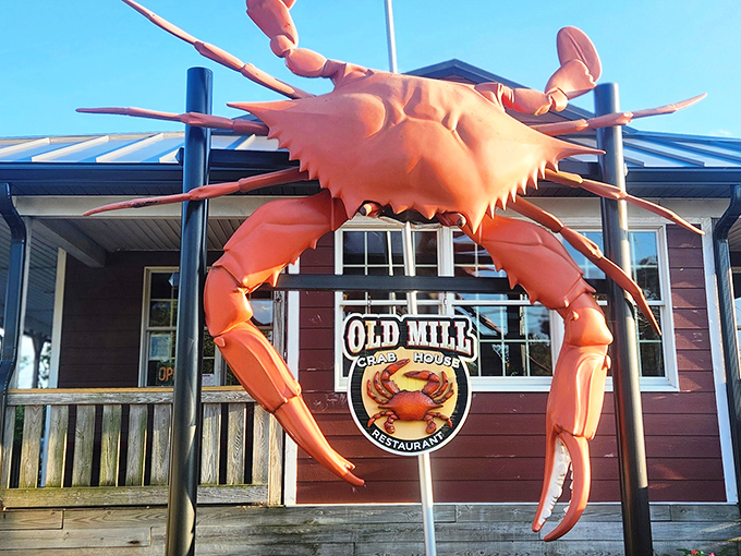The giant orange crab perched atop Old Mill's entrance isn't just decoration—it's a beacon calling seafood lovers home from miles around.