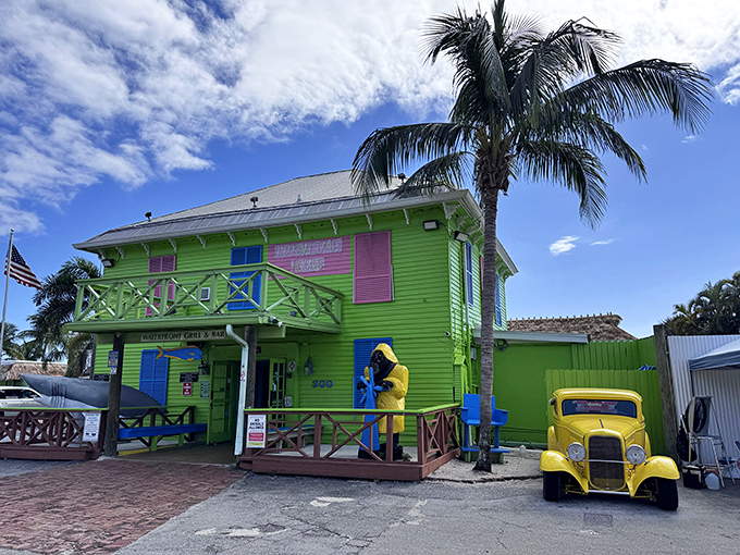 A vintage yellow hot rod parked outside completes the postcard-perfect scene. This isn't just a restaurant—it's a technicolor time machine to old Florida.