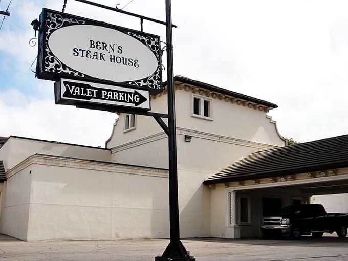 That classic sign promises more than parking—it's a beacon for beef lovers across Florida signaling "culinary nirvana ahead."