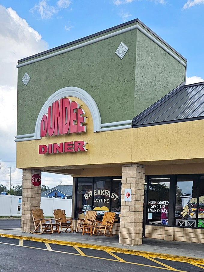 The green and yellow facade of Dundee Diner beckons with its promise of "Breakfast Anytime" and those wooden rocking chairs—Florida's version of a velvet rope line.