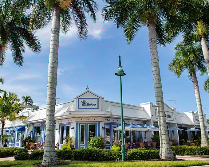 The blue and white façade of Bleu Provence isn't just Instagram-worthy—it's your first clue that culinary magic awaits inside this Naples gem.