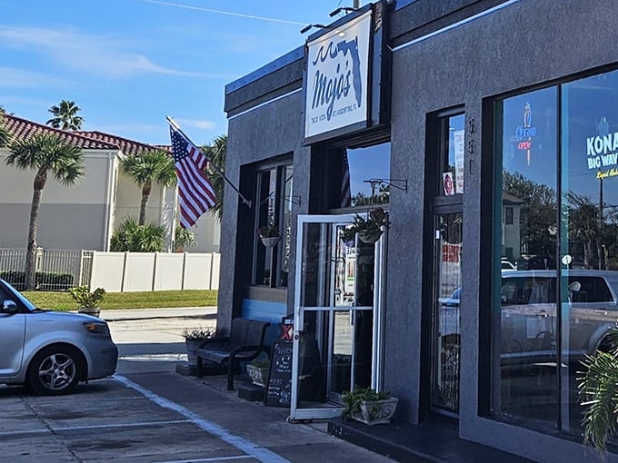A slice of St. Augustine charm with an American flag proudly displayed – Mojo's storefront beckons hungry travelers and locals alike.