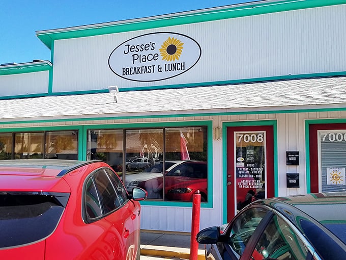 Sunflower logo and teal trim – nature's way of saying "good food inside" without needing a neon sign.
