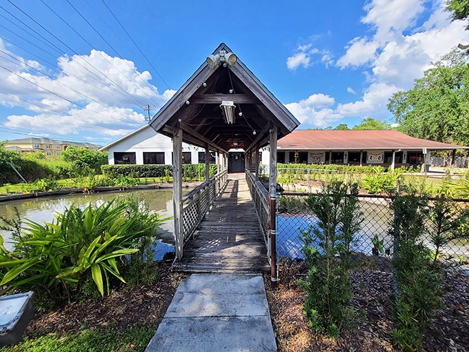 The iconic wooden bridge to Frontier Steakhouse isn't just an entrance—it's a promise that you're crossing over into serious steak territory.