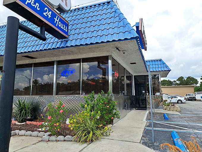 The iconic blue roof of Papa's stands out like a beacon for hungry souls. Open 24 hours because cravings don't follow clocks.