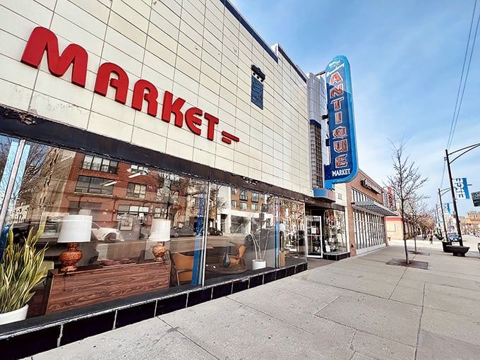 The iconic Art Deco facade of Broadway Antique Market beckons treasure hunters with its vintage signage and glimpses of wonders within.