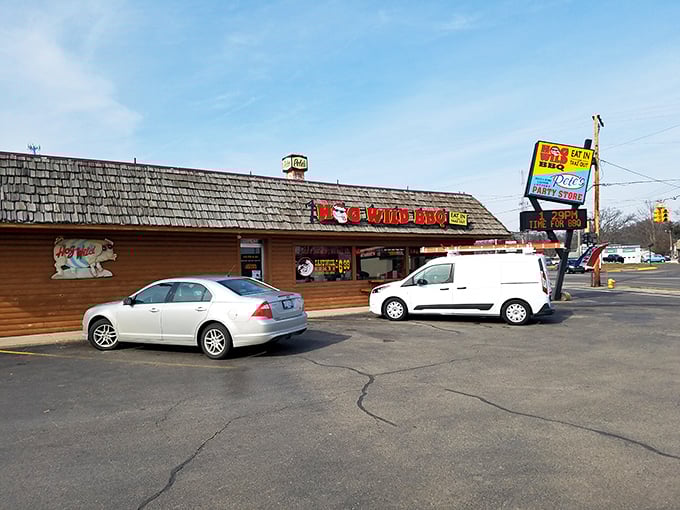 Daylight reveals the unassuming charm of this barbecue haven. Like all great BBQ joints, it doesn't need fancy architecture—the smoke signals from the kitchen tell the real story.