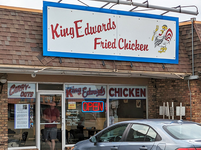 The blue and red sign beckons like a lighthouse for the hungry. King Edwards keeps it simple—when you're this good at chicken, fancy facades are optional.
