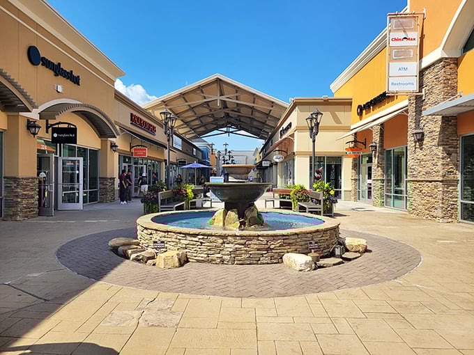 A picturesque fountain creates a peaceful oasis amid shopping madness. Perfect spot to contemplate whether you really need that fifth shopping bag.