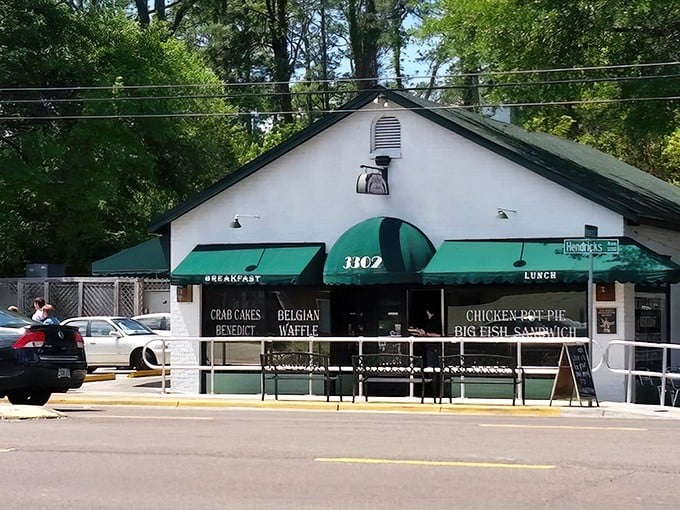 The white brick building with its signature green awning promises comfort food nirvana. This Jacksonville landmark beckons like an old friend with a delicious secret.