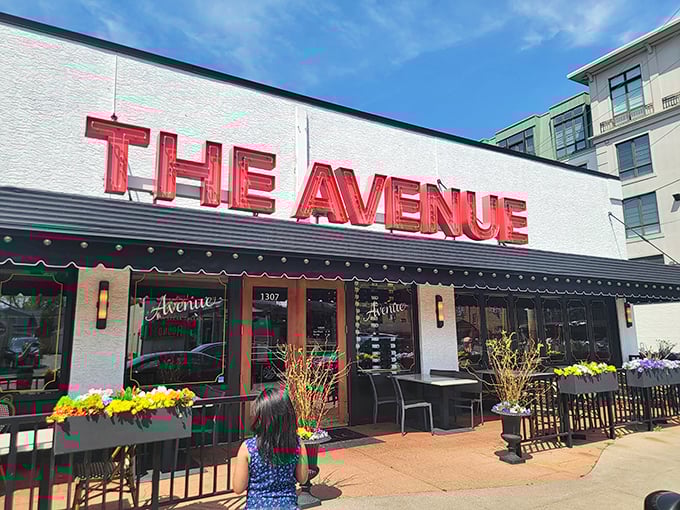 The bold red signage of The Avenue beckons like a lighthouse for the hungry, promising refuge from mediocre meals in Columbus's dining landscape.