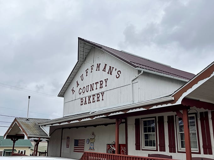 The white barn-style exterior of Kauffman's Country Bakery stands as a beacon of baked brilliance in Millersburg, promising sweet treasures within. Open seven days—because dessert emergencies don't take weekends off.