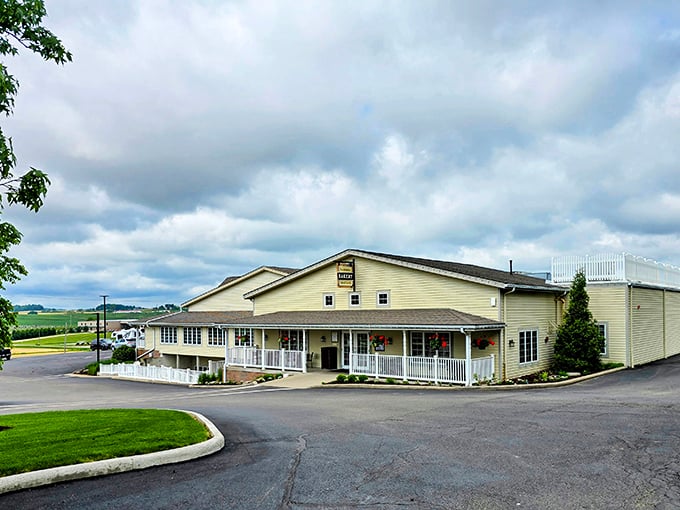 The unassuming yellow exterior of Dutch Valley Bakery stands like a beacon of hope for hungry travelers. Behind those walls, pie paradise awaits.