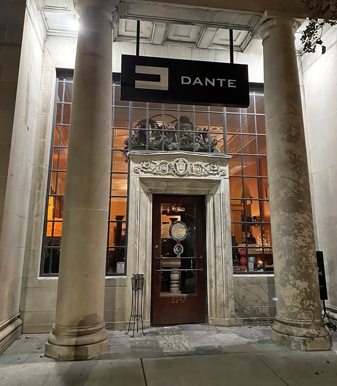 Winter evening at Dante, where the illuminated former bank stands as a beacon of gastronomic promise on Cleveland's Professor Avenue.