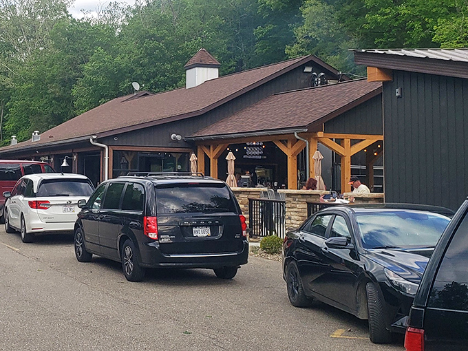 The rustic charm of The Bear's Den beckons from the roadside, promising carnivorous delights within its timber walls. No GPS required—just follow the scent of sizzling steaks.