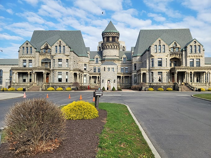 Gothic grandeur meets prison reality at the Ohio State Reformatory. This imposing limestone facade has welcomed visitors, inmates, and Hollywood film crews for generations.